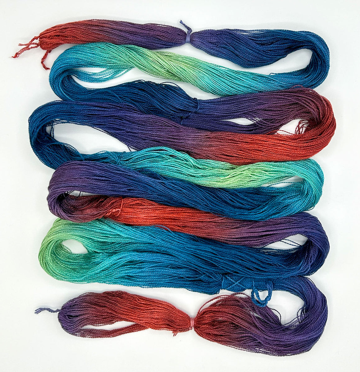 "Indiana Aurora" Small Batch Hand-Painted Tencel™ Warps – Shiny Dime Fibers